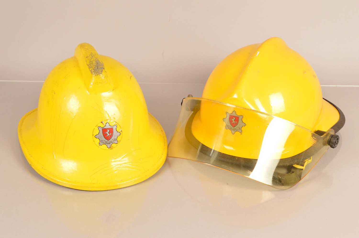 Lot 247 - Two 1990s Fire Fighters helmets,