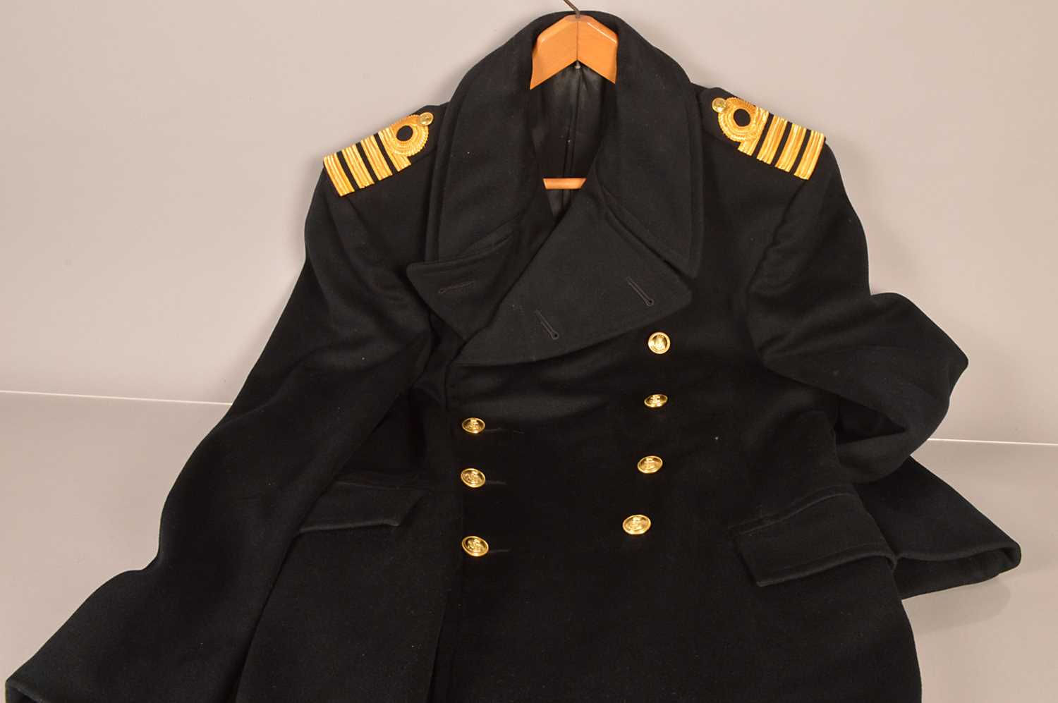 Lot 516 - A collection of Naval Captain Uniforms,