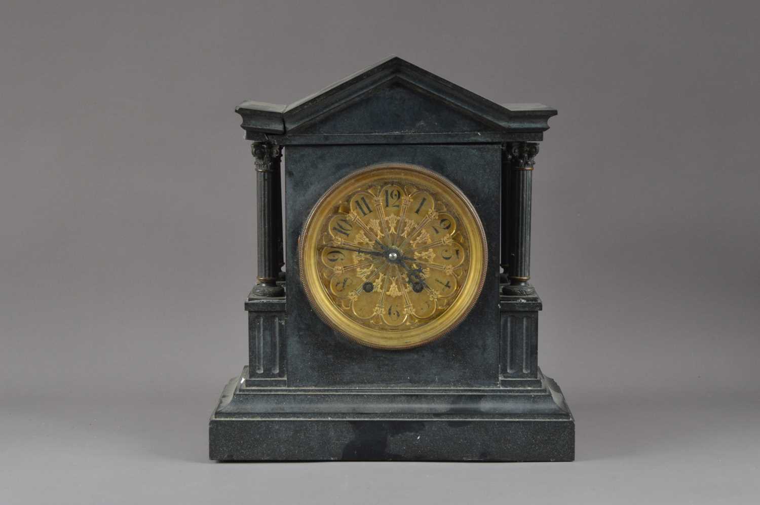 Lot 344 - A late 19th century slate mantle clock,