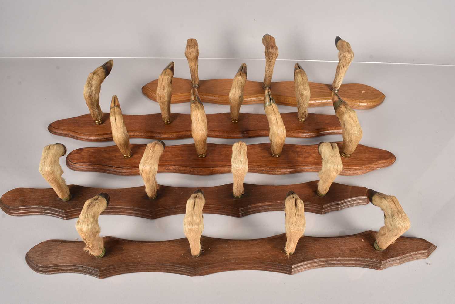 Lot 231 - Two pairs of Deer Hoof gun racks,