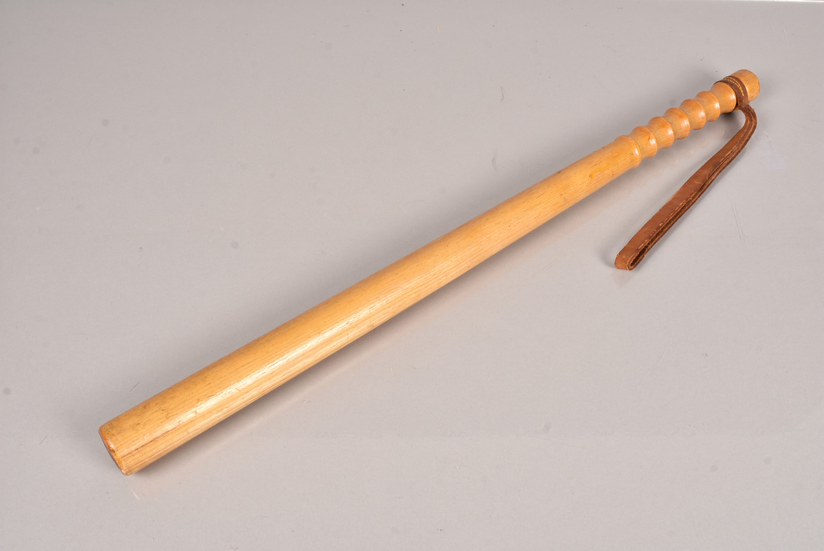 Lot 447 - A Vintage 1970s wooden Police Truncheon,