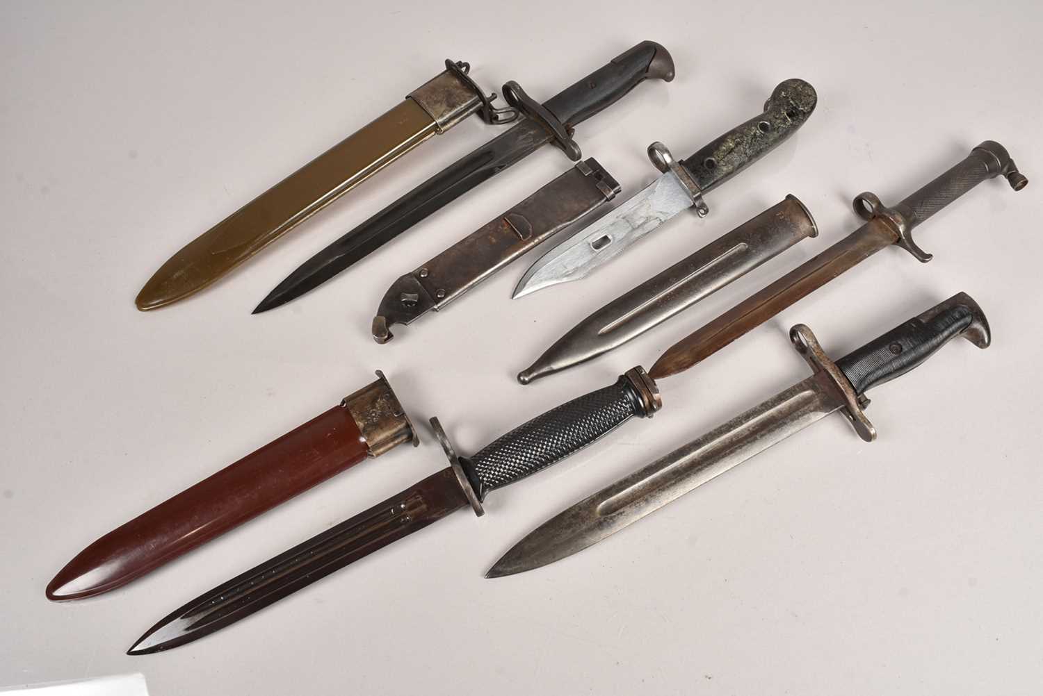 Lot 842 - A group of five various style bayonets,