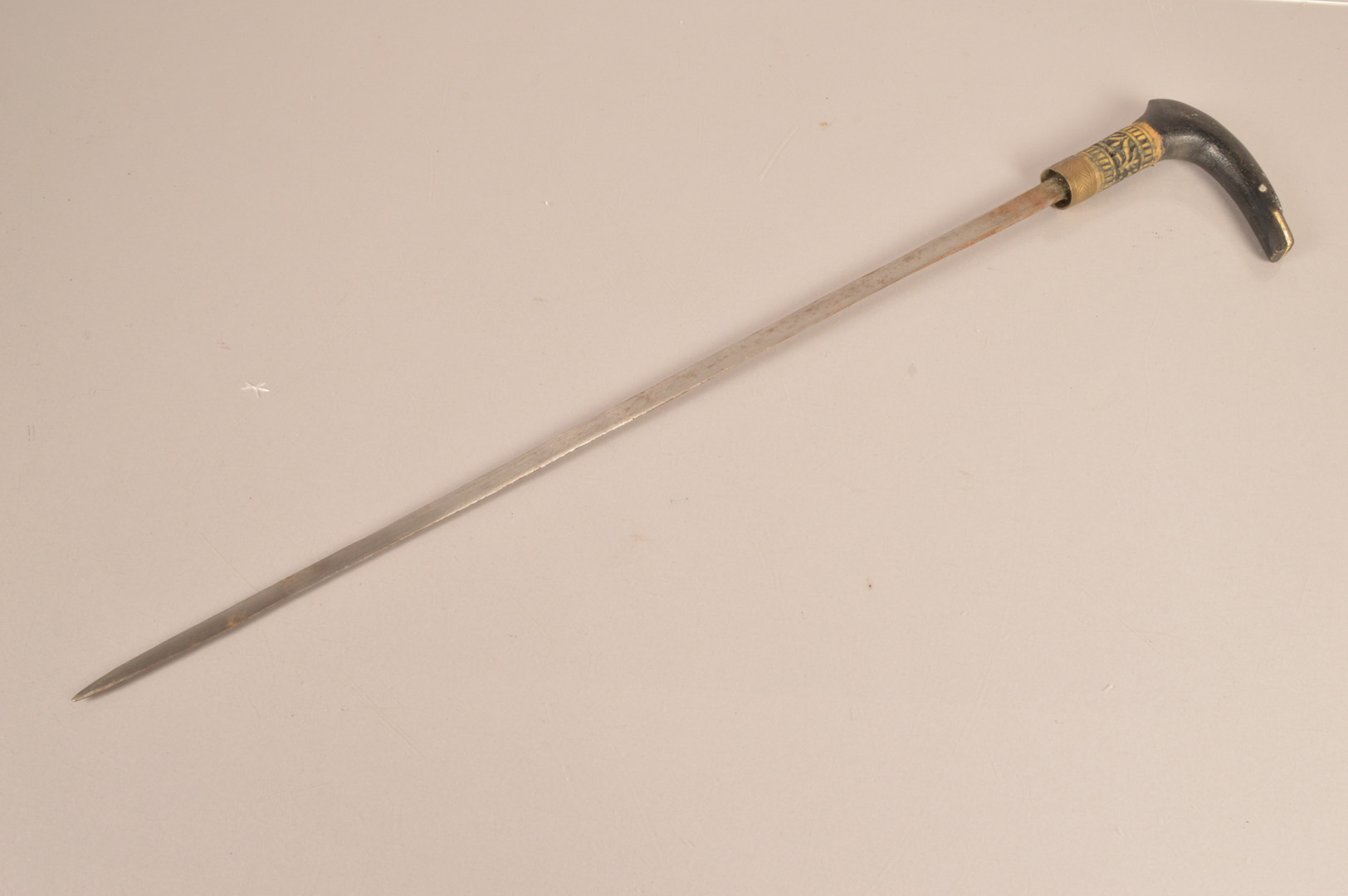 An early 20th Century Middle Eastern sword stick - auctions & price archive