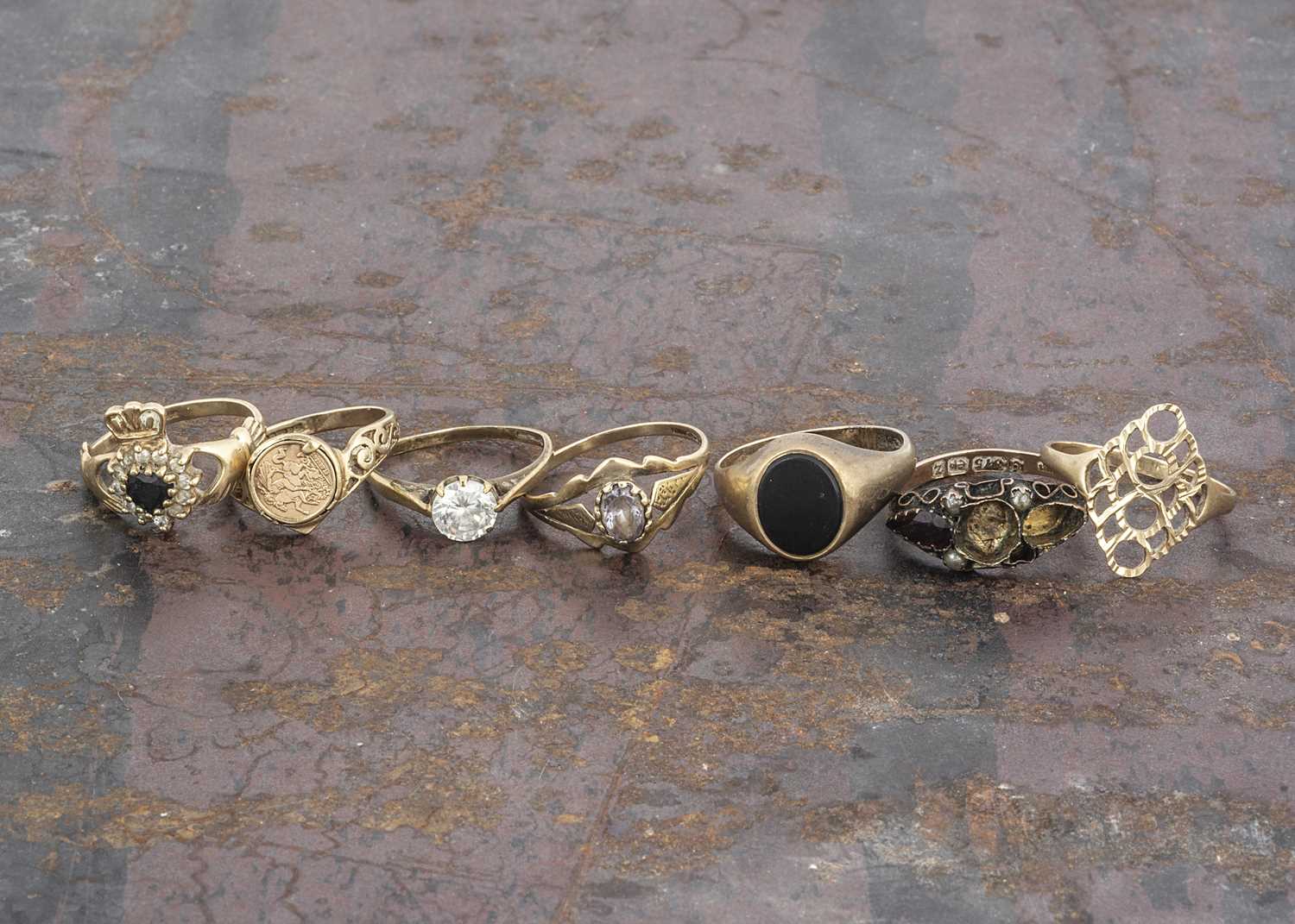 Lot 88 - Seven gold rings,