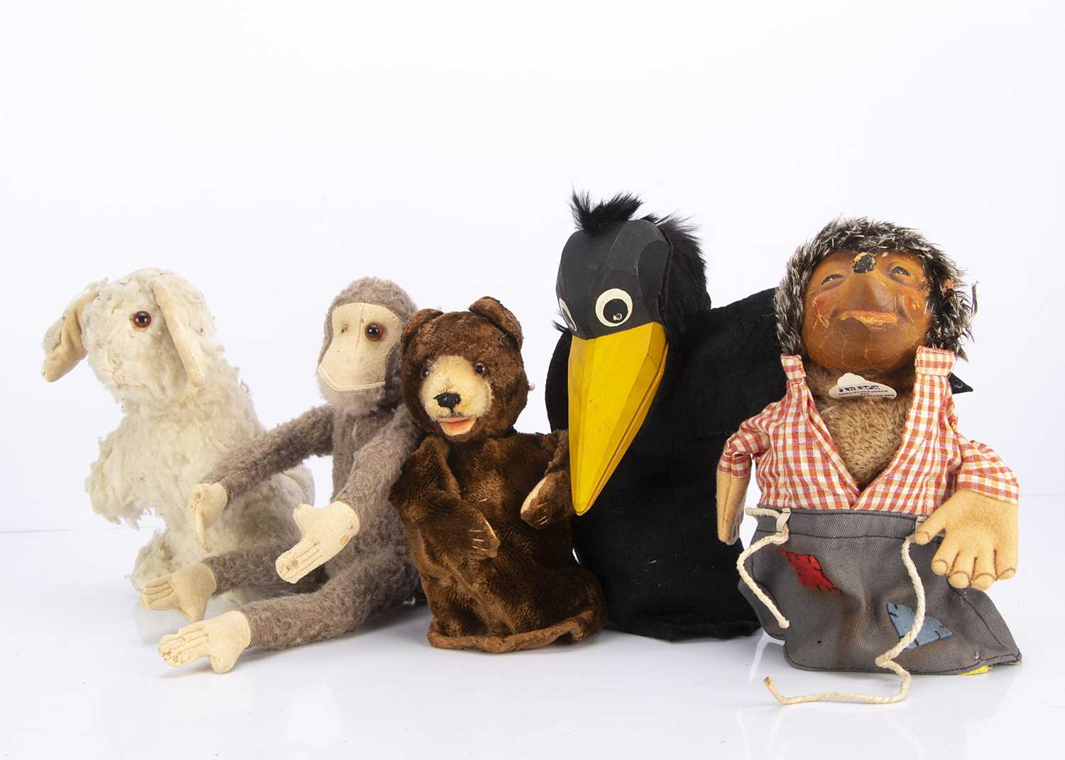 Lot 311 - Three hand puppets,