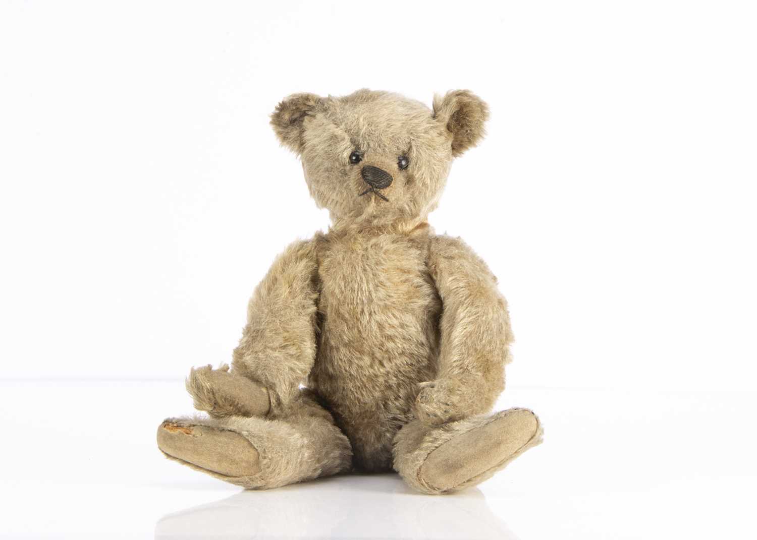 Lot 341 - A fine and early Steiff blank button teddy
