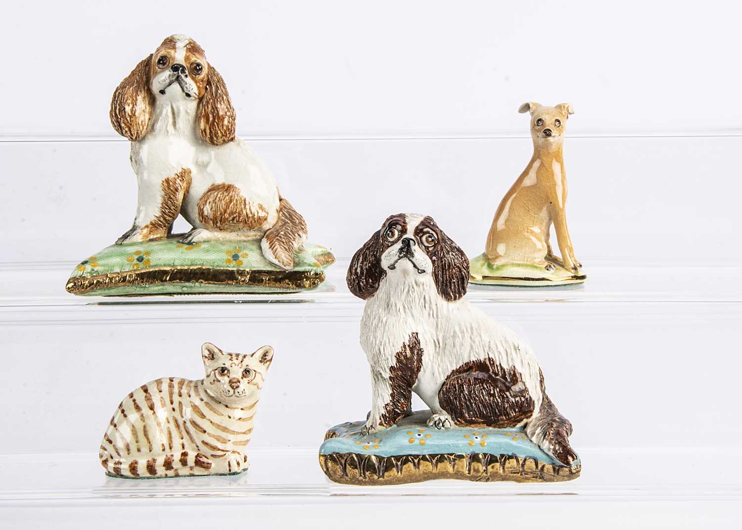 Lot 684 - Three Basil Matthews pottery dogs,