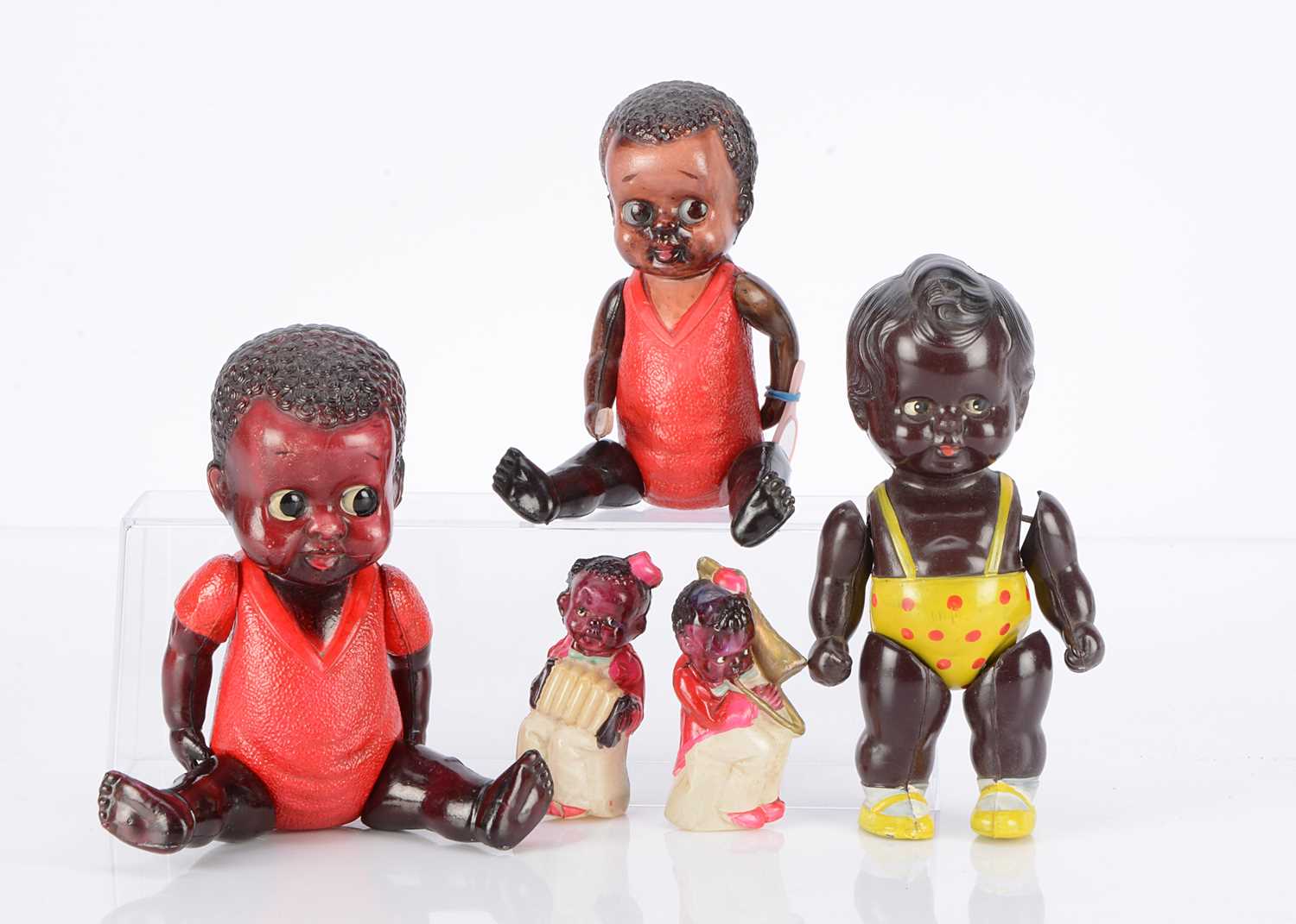 Lot 911 - Japanese celluloid black dolls and figures,
