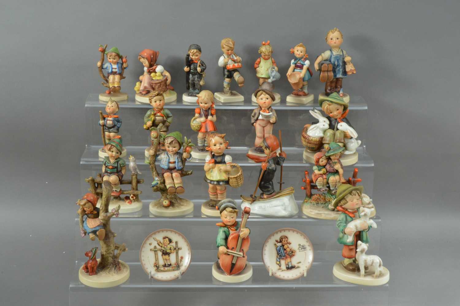 Lot 315 - A large collection of Hummel ceramic figures,