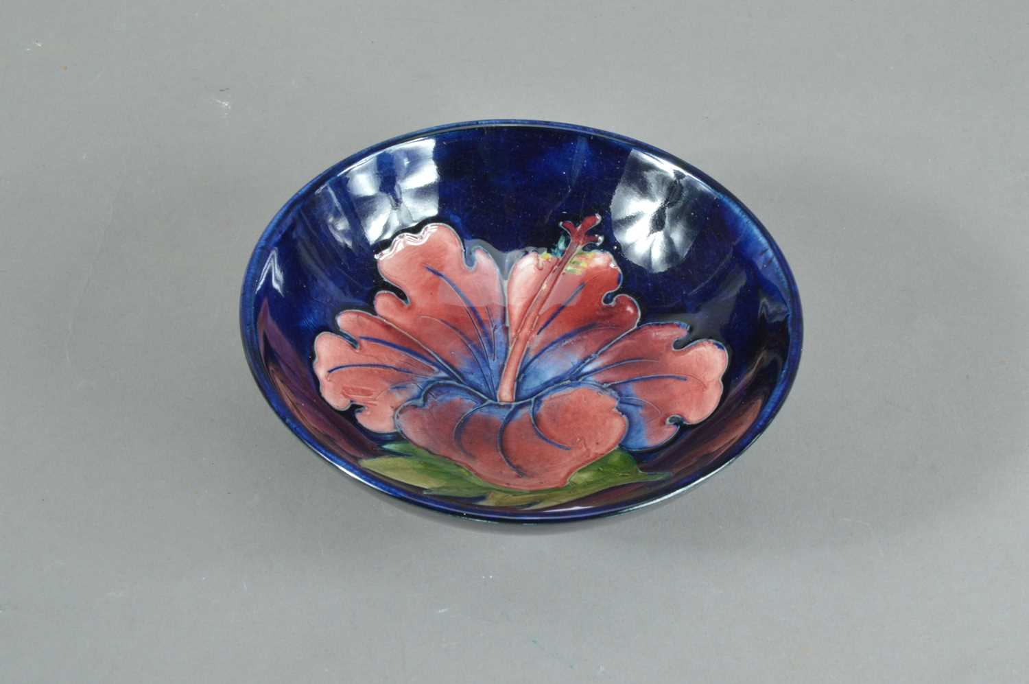Lot 335 - An early Moorcroft pottery footed bowl,