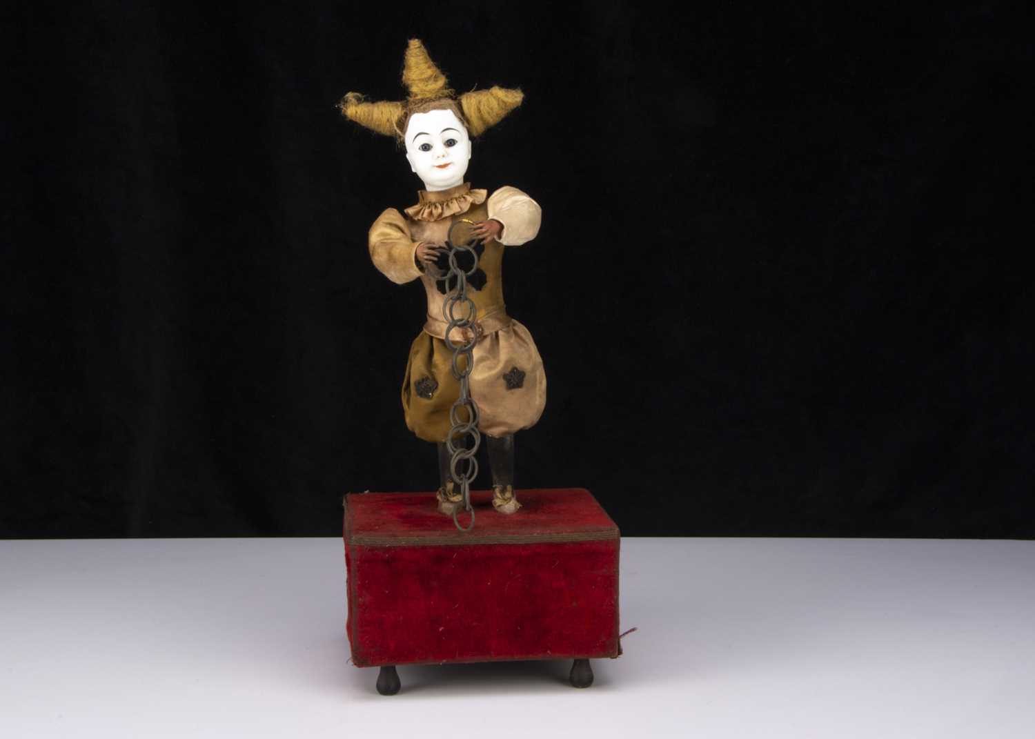 Lot 272 - A late 19th century French white faced clown