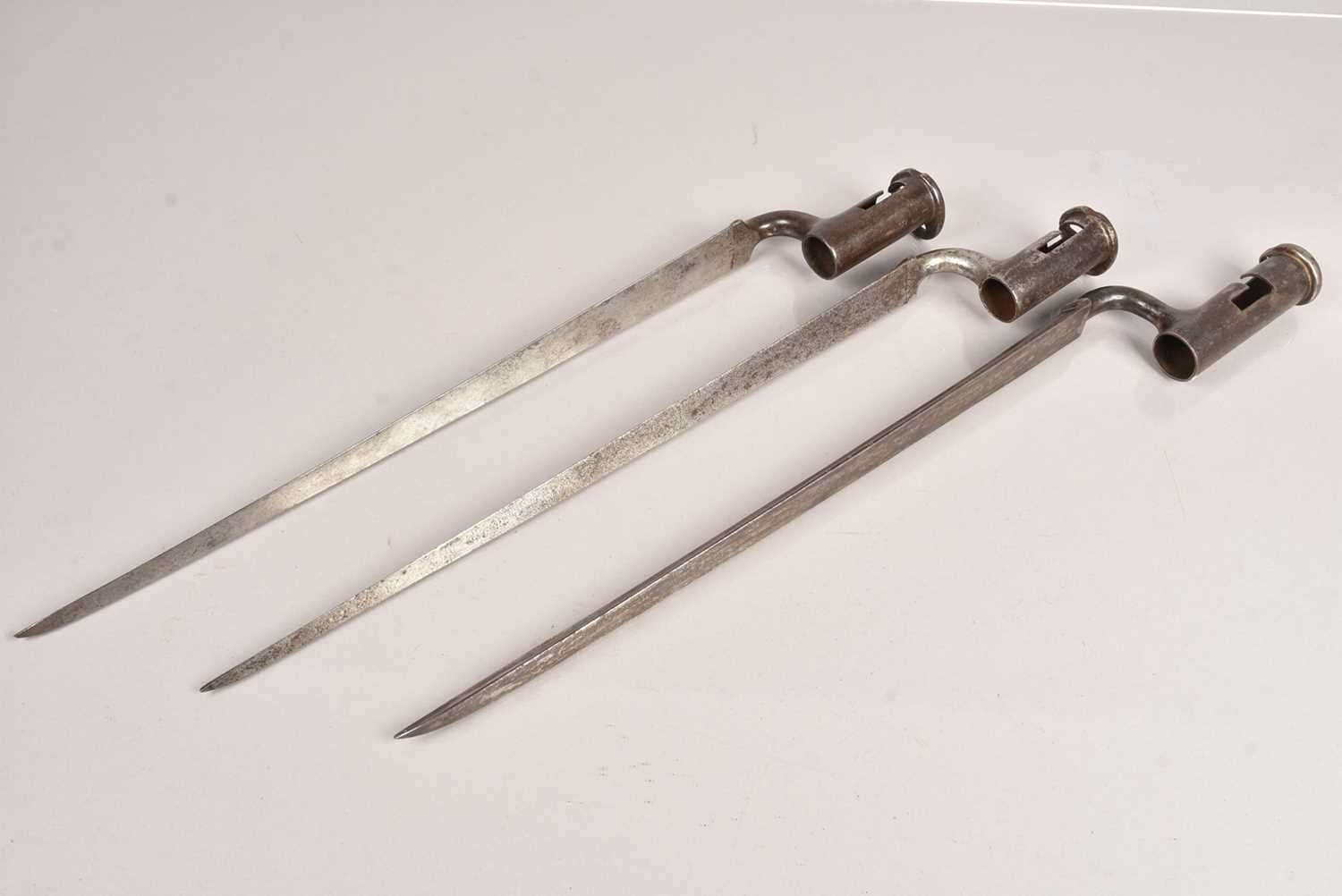 Lot 760 - A group of three socket bayonets,