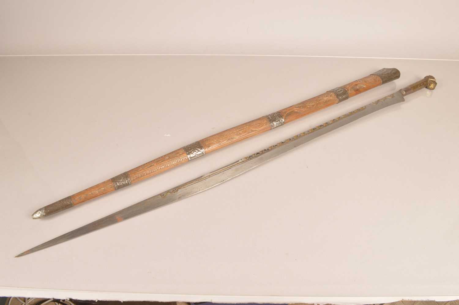Lot 790 - A North African Flyssa sword,