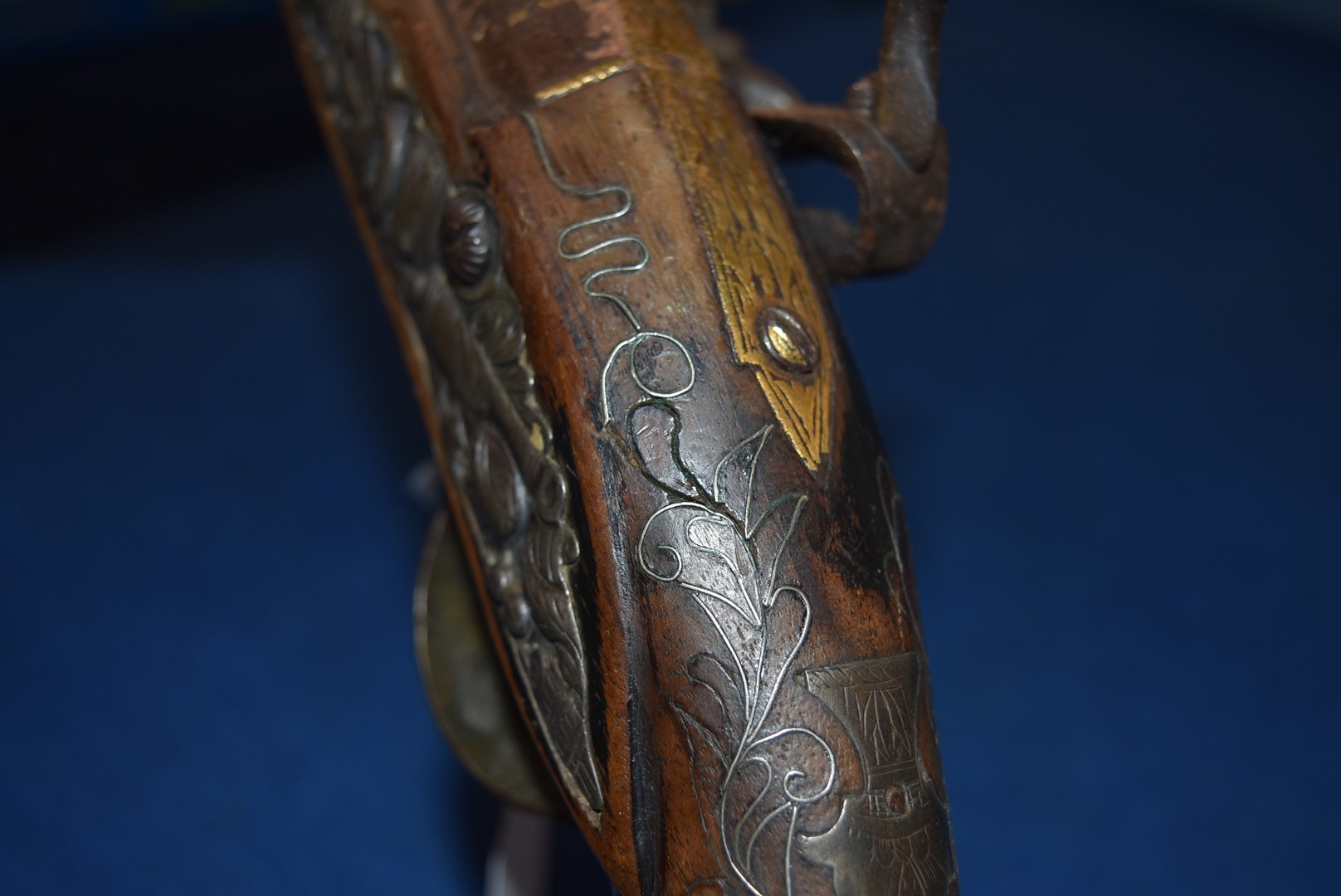 Lot 807 - A Middle Eastern decorated flintlock pistol,