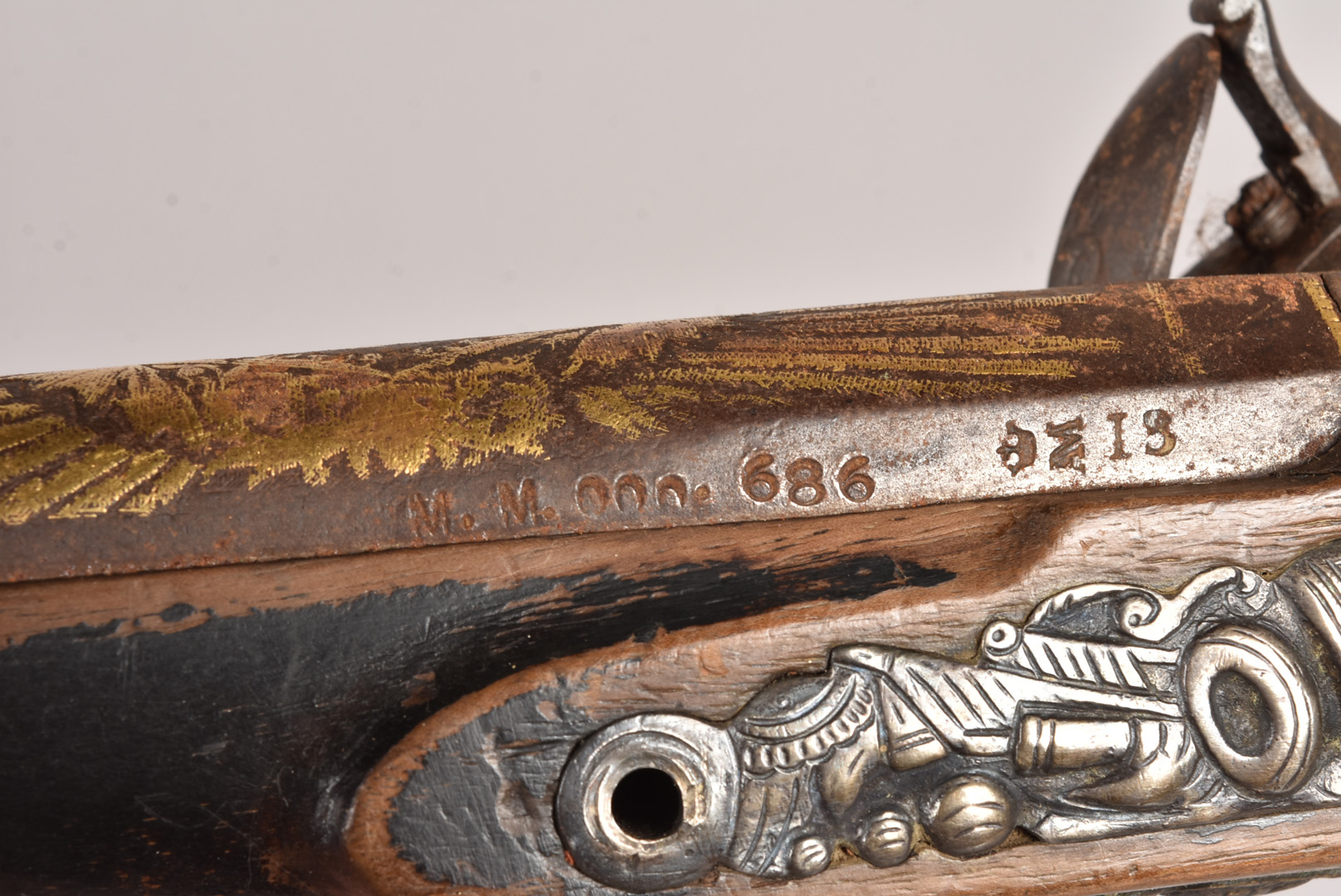 Lot 807 - A Middle Eastern decorated flintlock pistol,