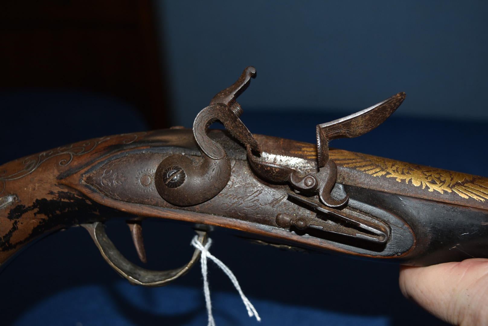 Lot 807 - A Middle Eastern decorated flintlock pistol,