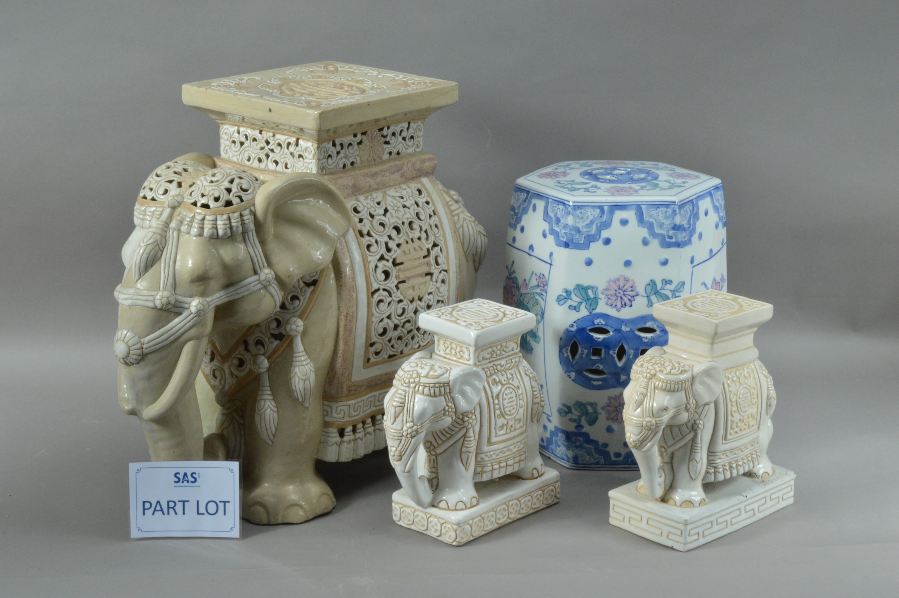 Lot 79 - Three large far eastern pottery elephants,