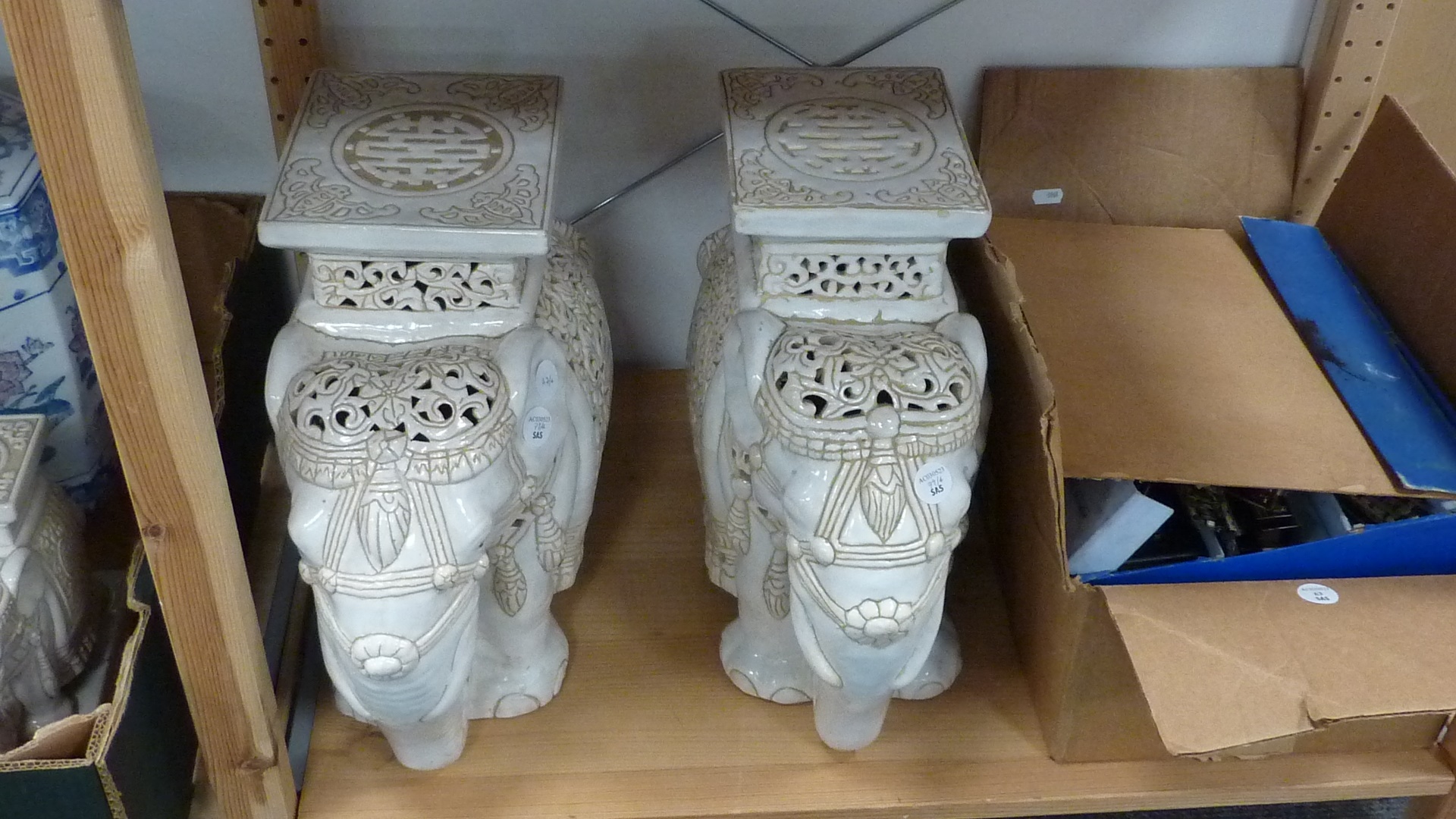 Lot 79 - Three large far eastern pottery elephants,