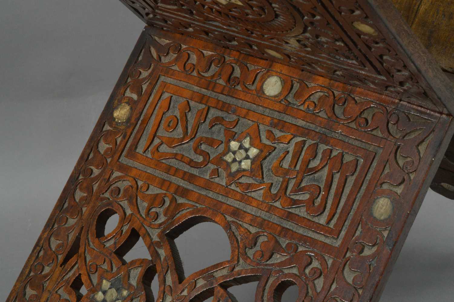 Lot 90 - A carved hardwood Quran stand,