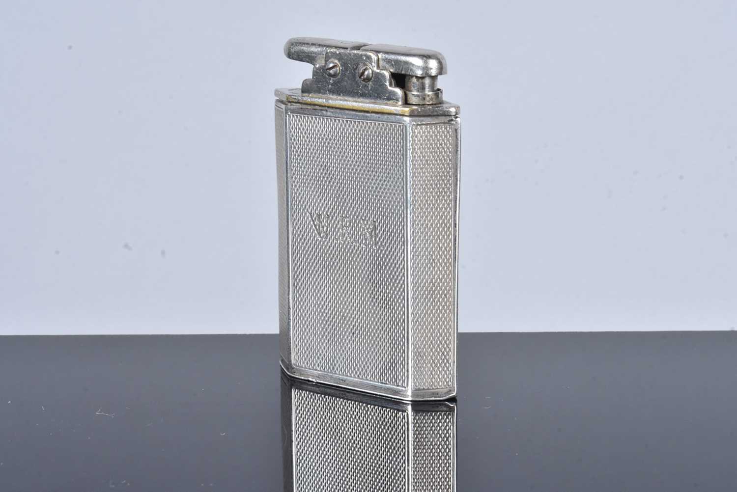 Lot 292 - A hexagonal silver pocket lighter,