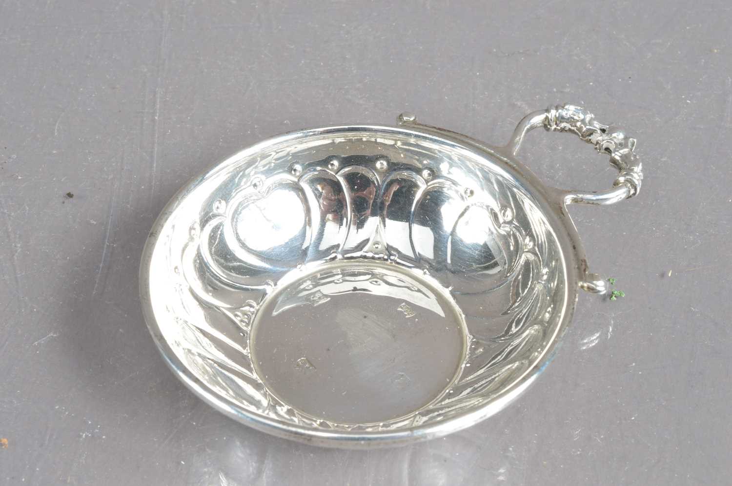 Lot 224 - A silver wine taster Tastevin,
