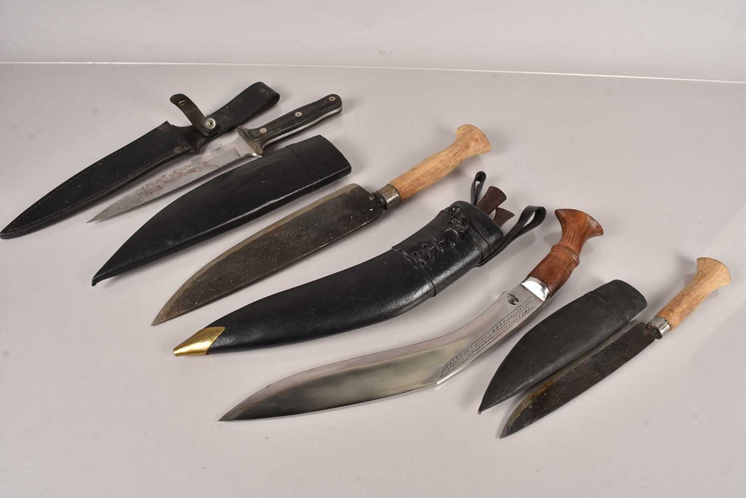 Lot 933 - A Middle Eastern Style Kukri knife,