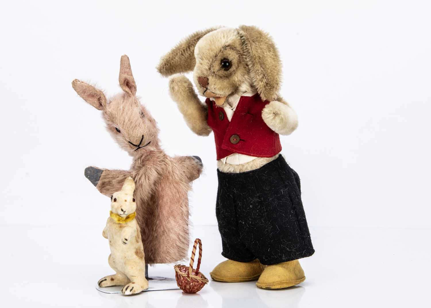 Lot 166 - Three toy rabbits,