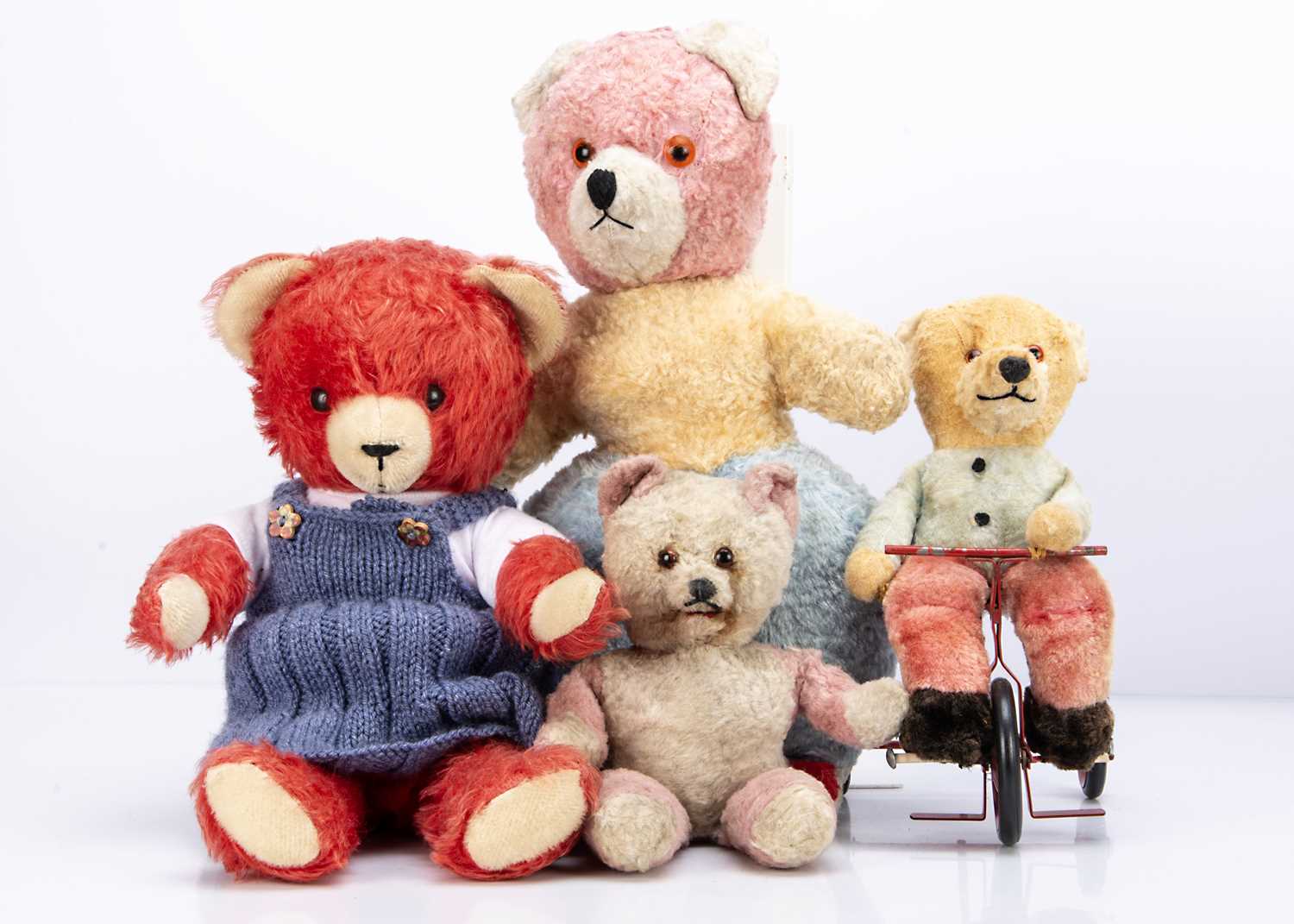 Lot 340 - Four colourful teddy bears,