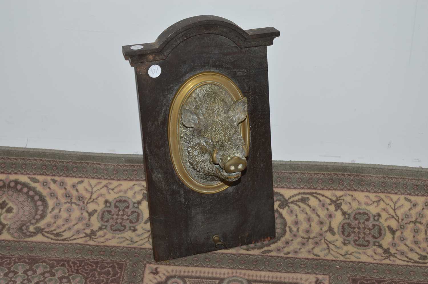 Lot 108 - A Victorian brass boar head wall mounted