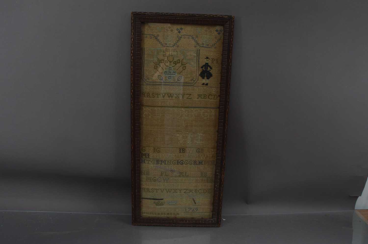 Lot 301 - An 18th Century alphabet sampler dated 1769,