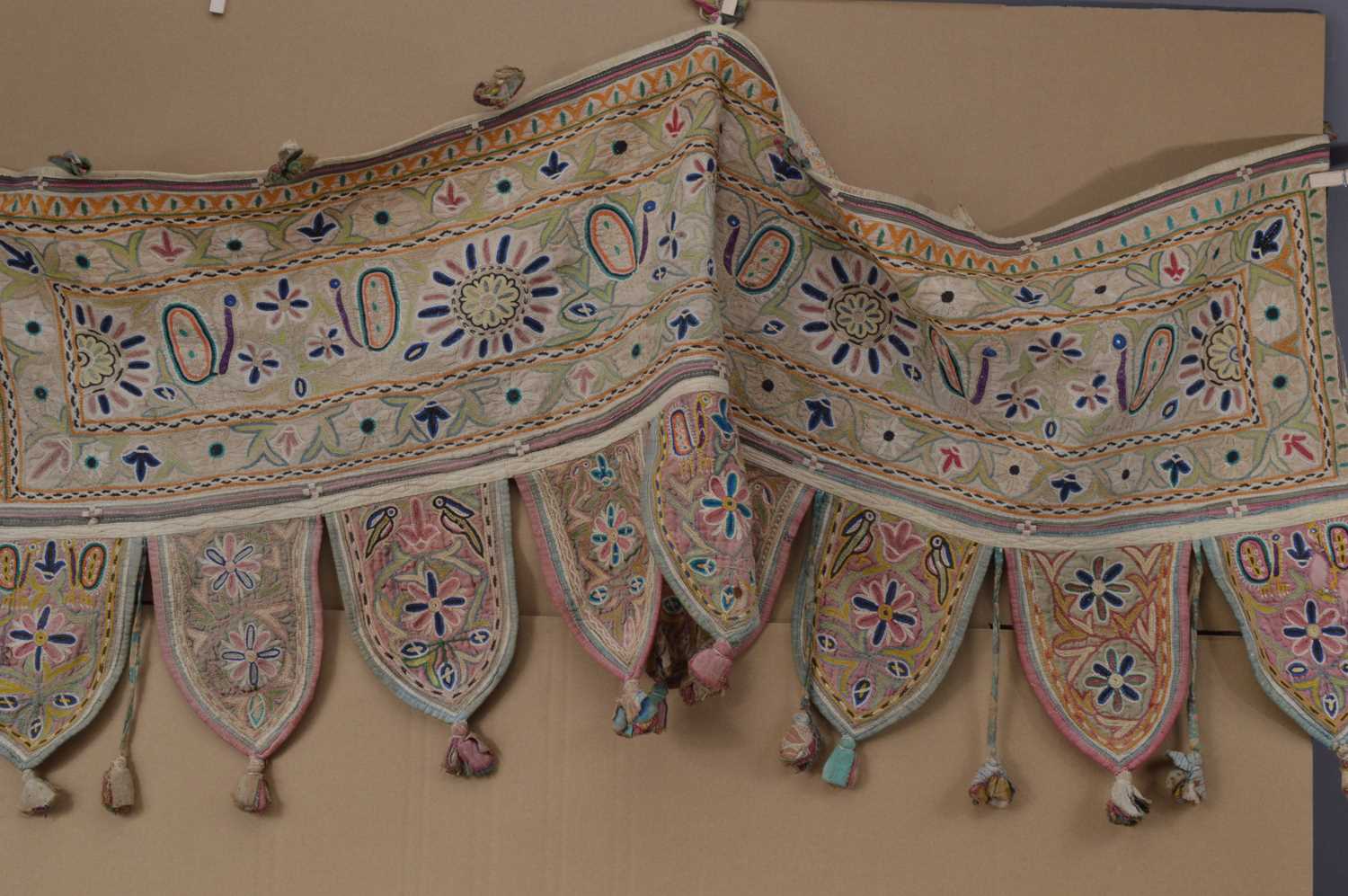 Lot 396 - An Antique Indian embodied portiere,