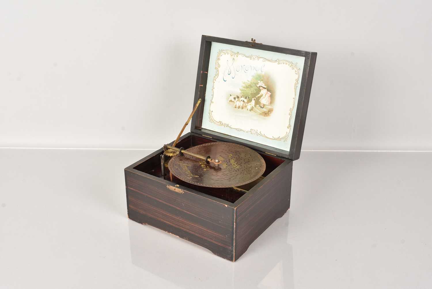 Lot 14 - A Monopol Table Disc Musical box,