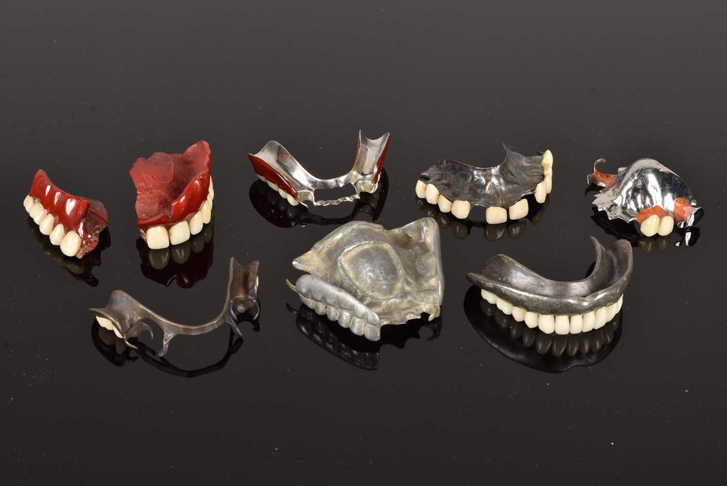 Lot 146 - A small collection of Antique Dentures,