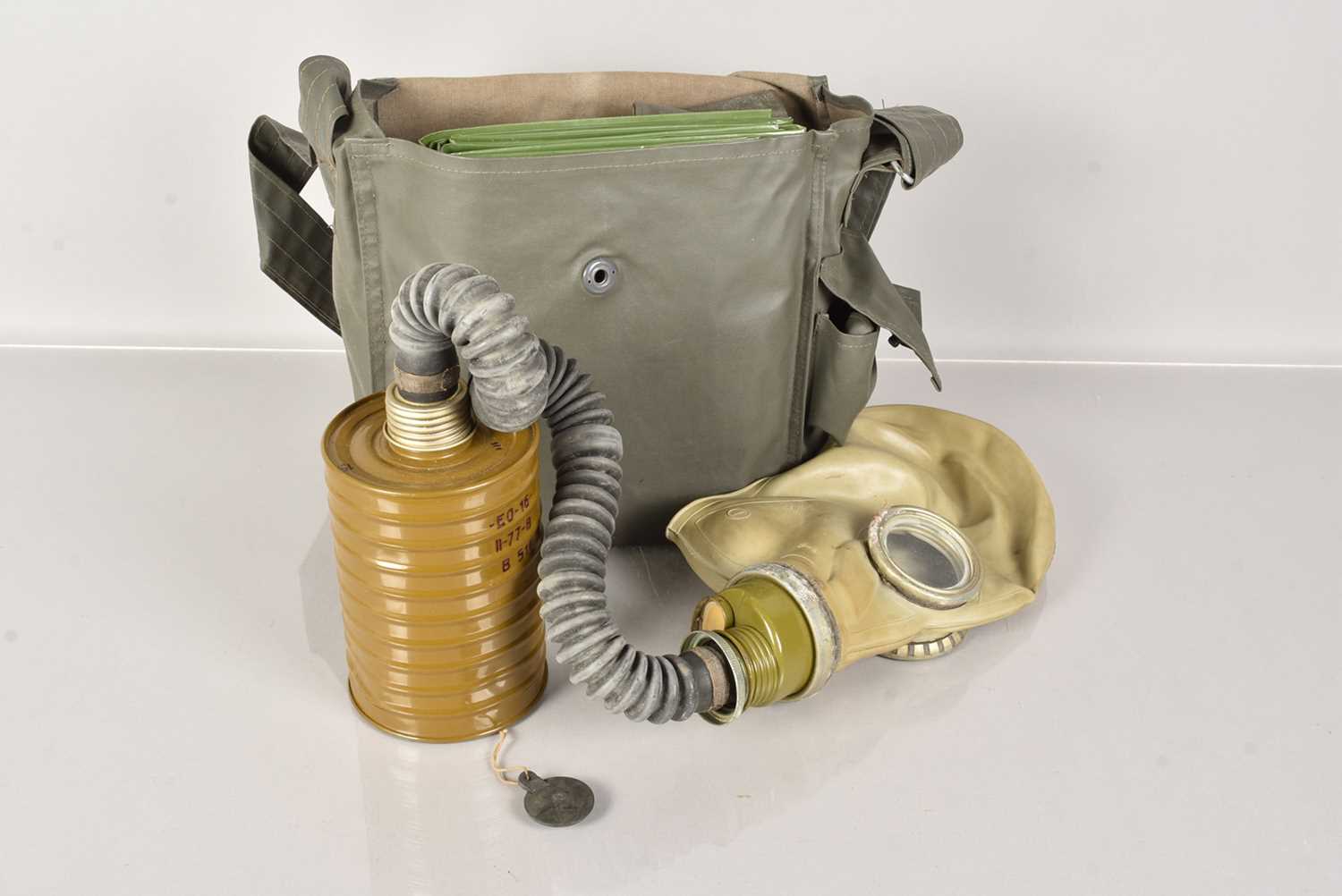 Lot 574 - A Polish/Soviet Gas Mask and Respirator,