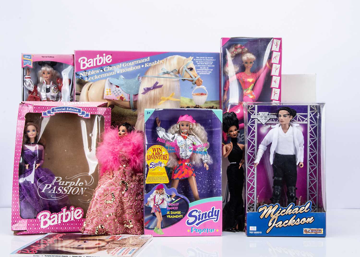 Lot 28 - Michael Jackson, Barbie and Sindy dolls,