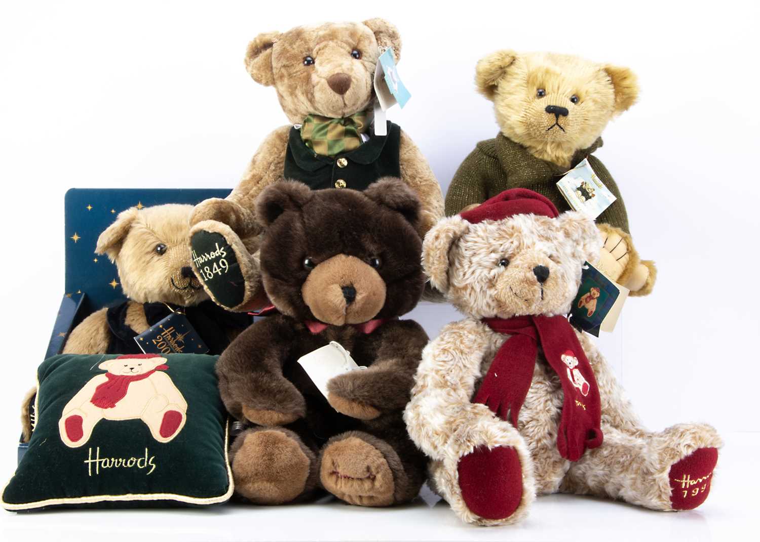 Lot 153 - Five Harrods teddy bears,