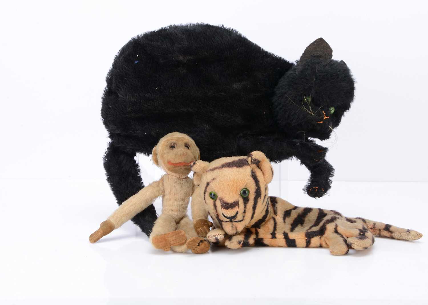 Lot 215 - A rare 1930s Omega black cat tea cosy,