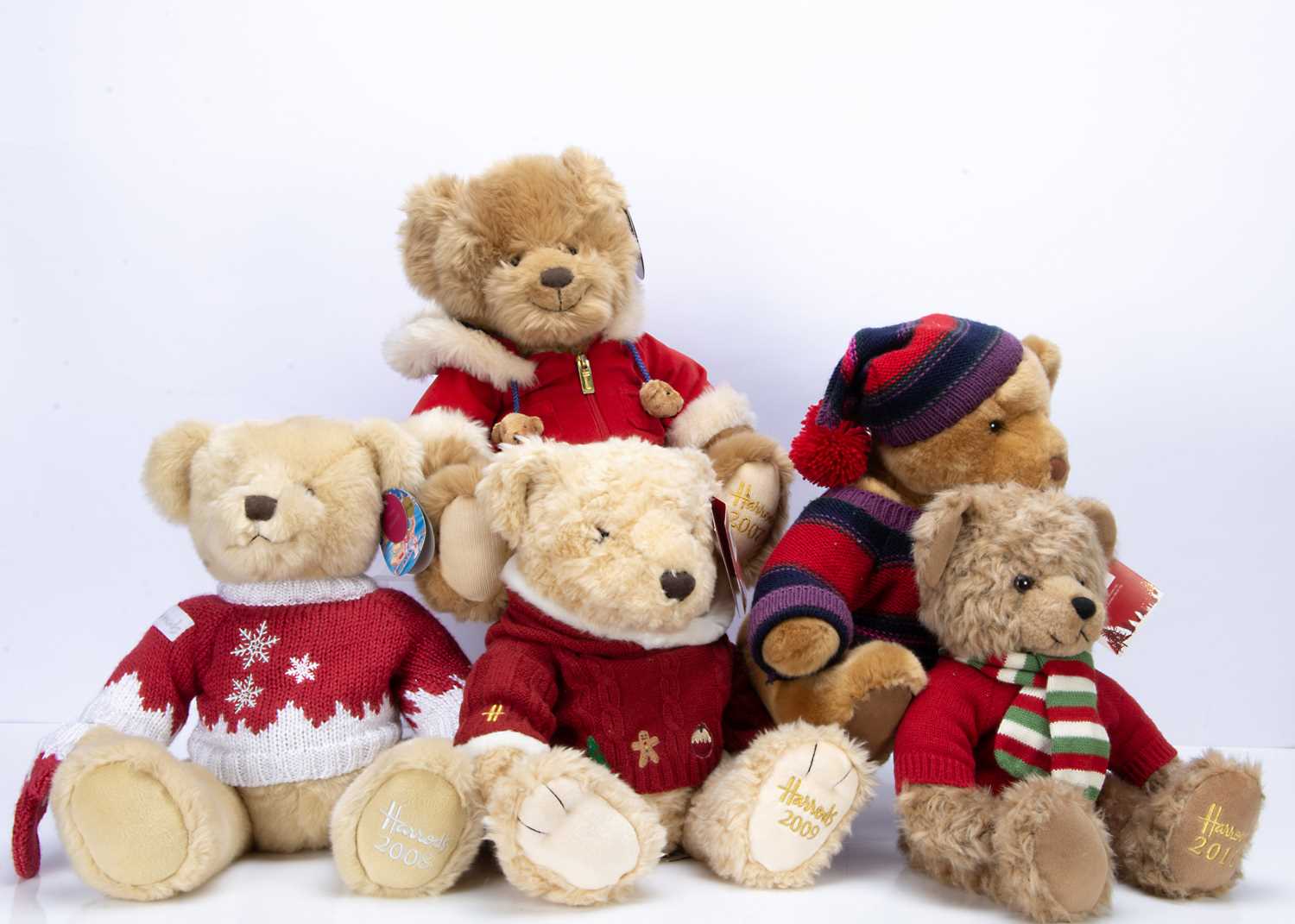 Lot 251 - Eight Harrods teddy bears,