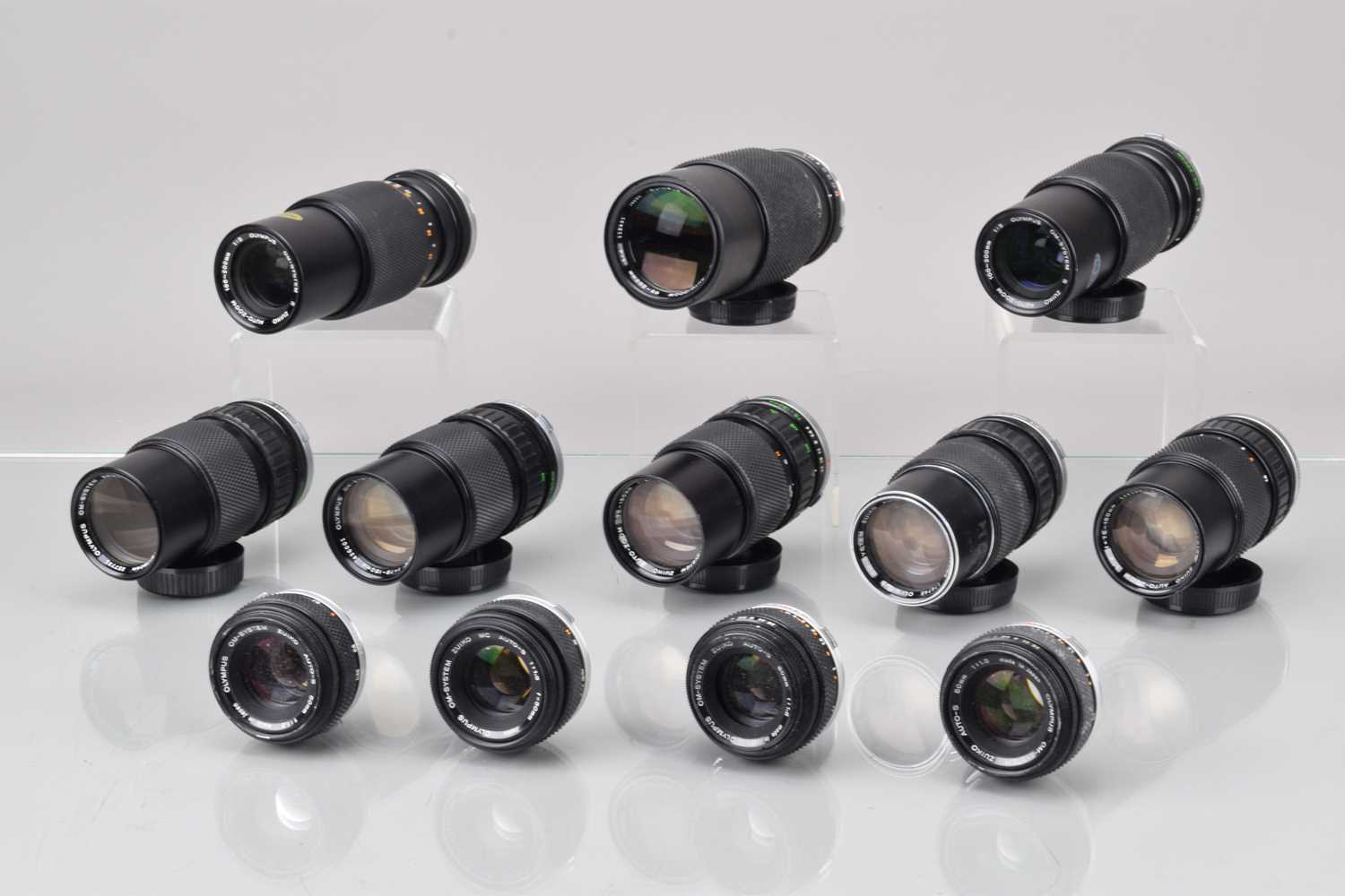 Lot 697 - A Group of Olympus OM Lenses,