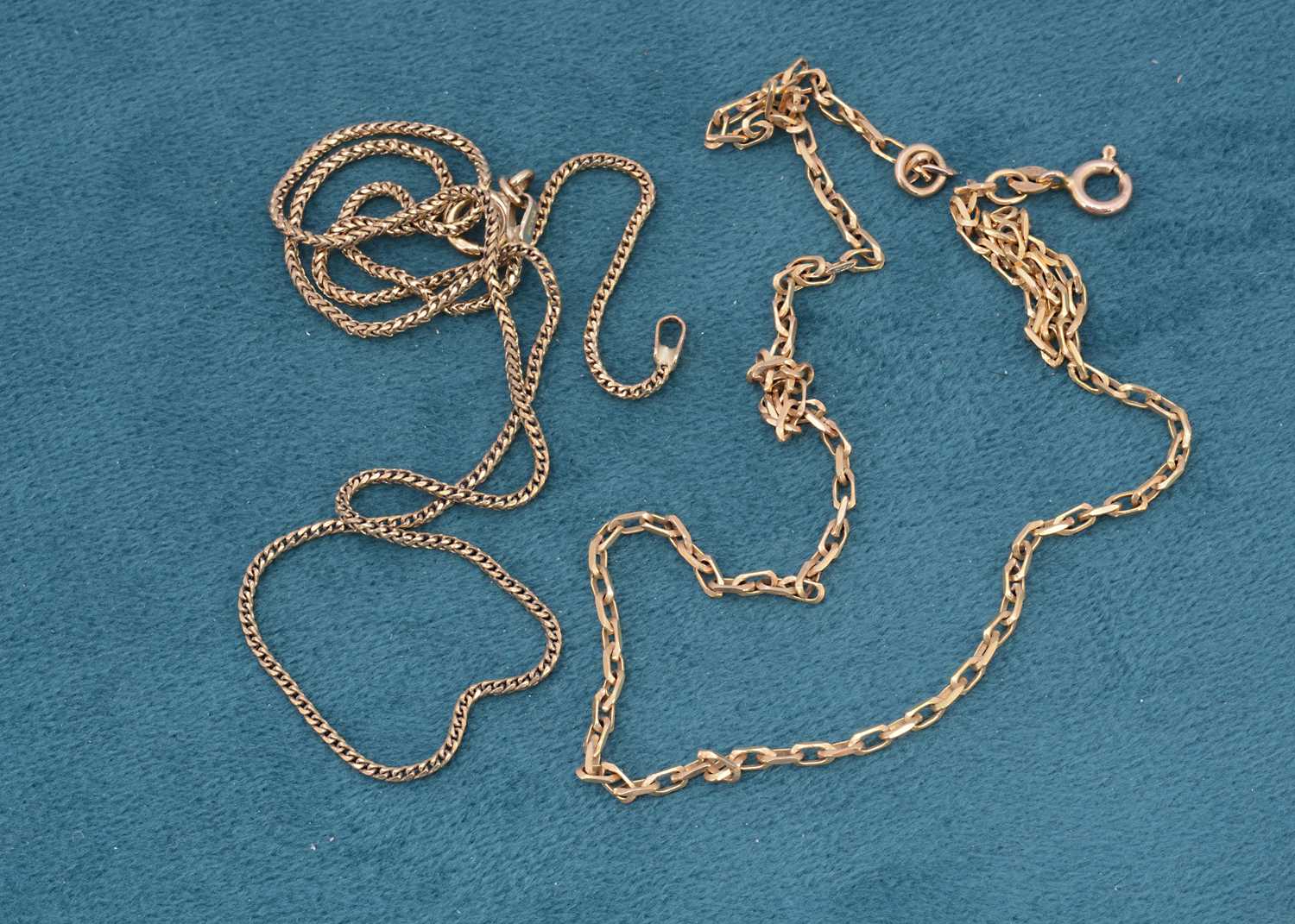 Lot 210 - Two 9ct gold chains,