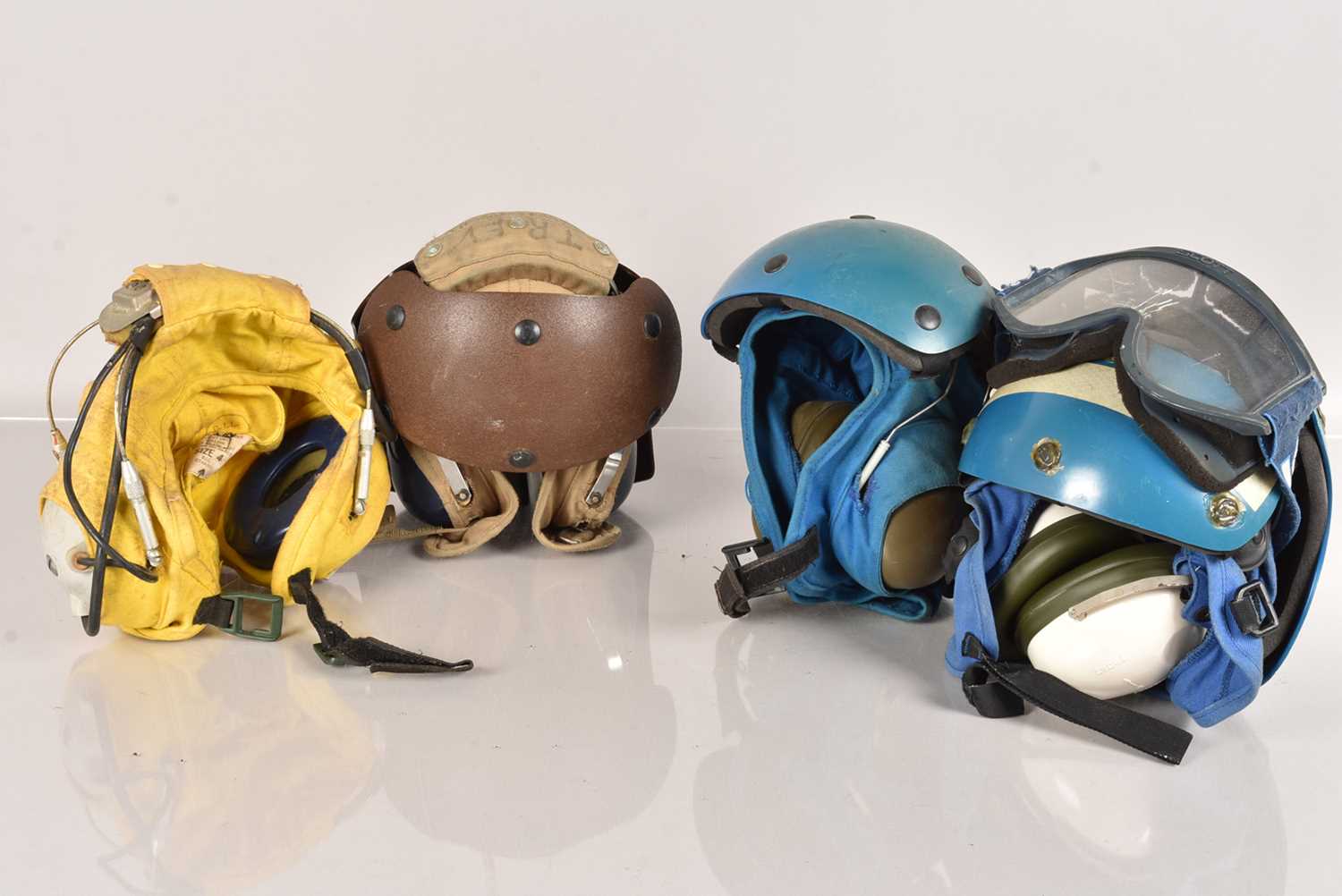 Lot 420 - A group of four Flight Deck Crewman Helmets,