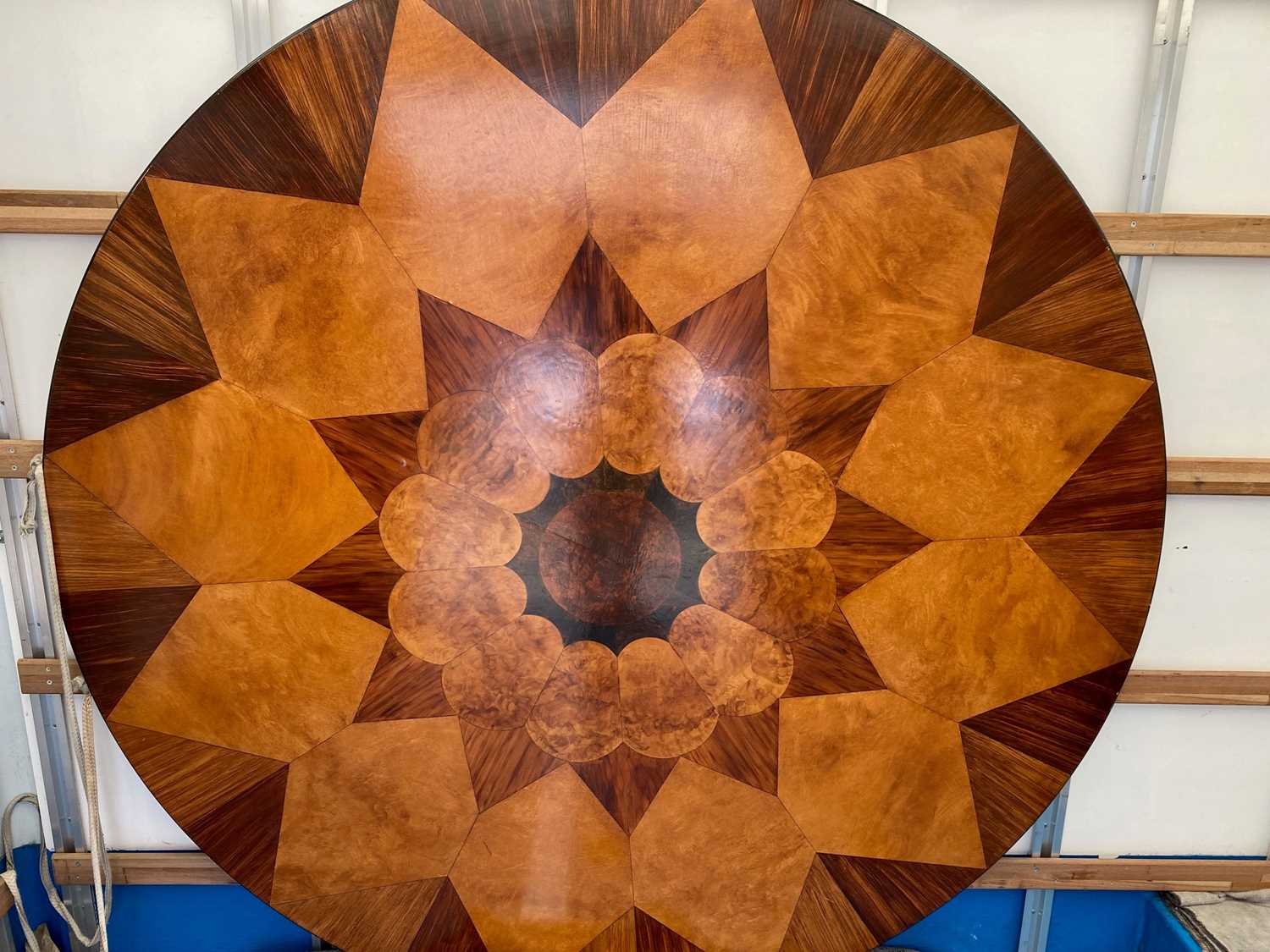 Lot 11 - A large painted circular table top,