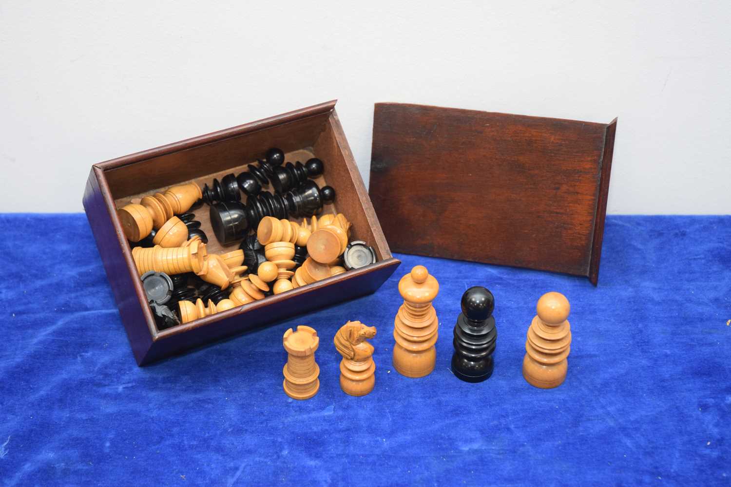 Lot 261 - A vintage chess set,