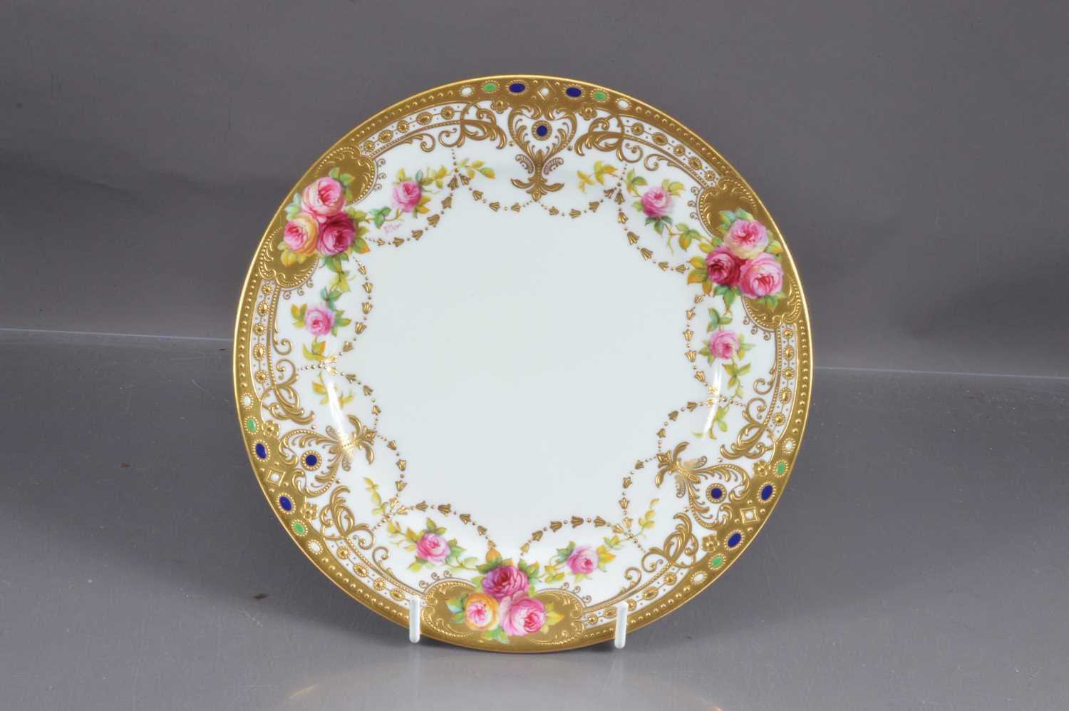 Lot 394 - A Cauldon porcelain cabinet plate,