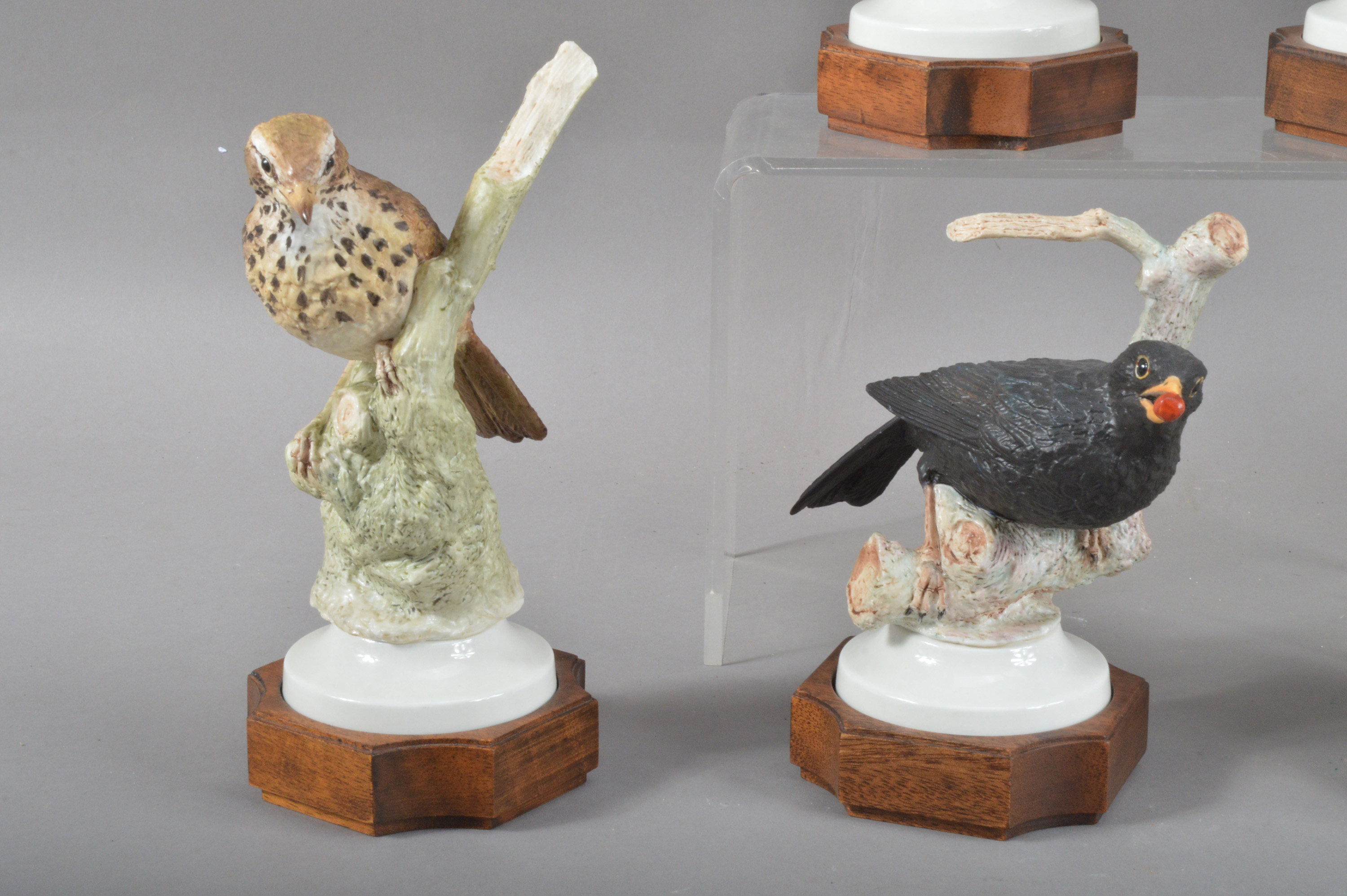 Lot 23 - A collection of Albany bone china figurines,