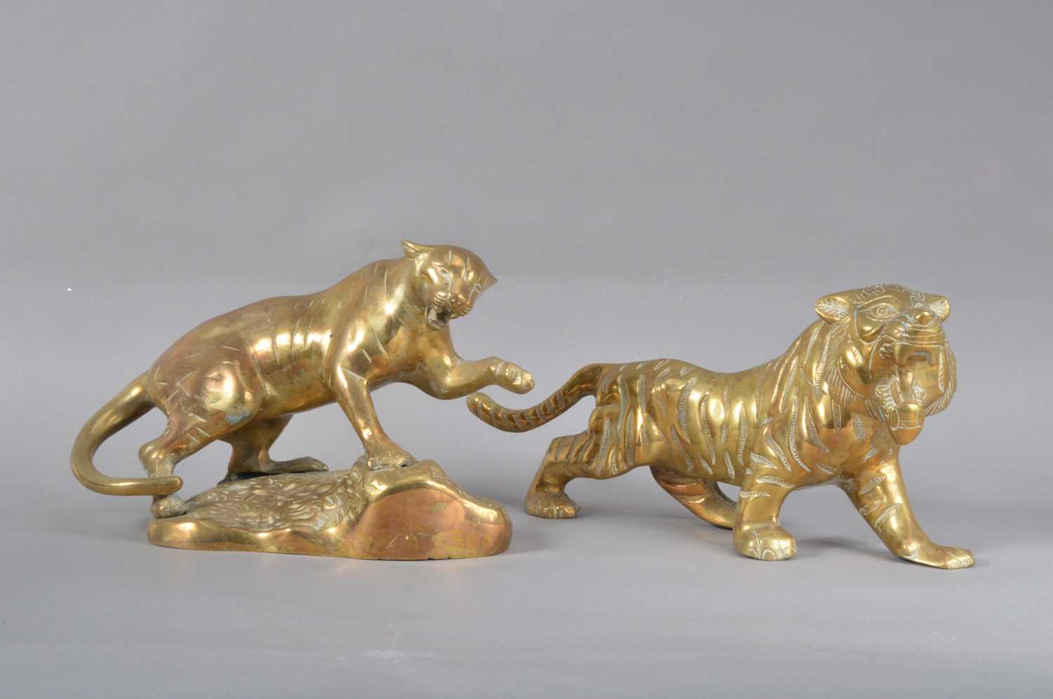 Lot 117 - Two 20th century brass Far Eastern animal