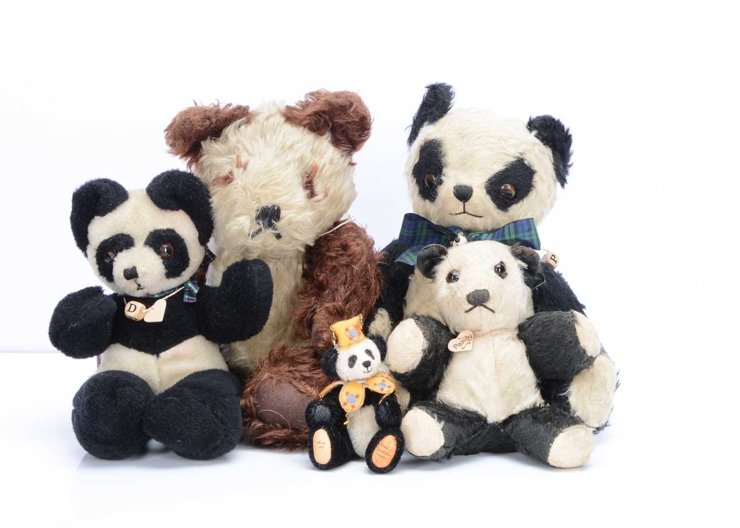 Lot 252 - Four vintage British panda bears,
