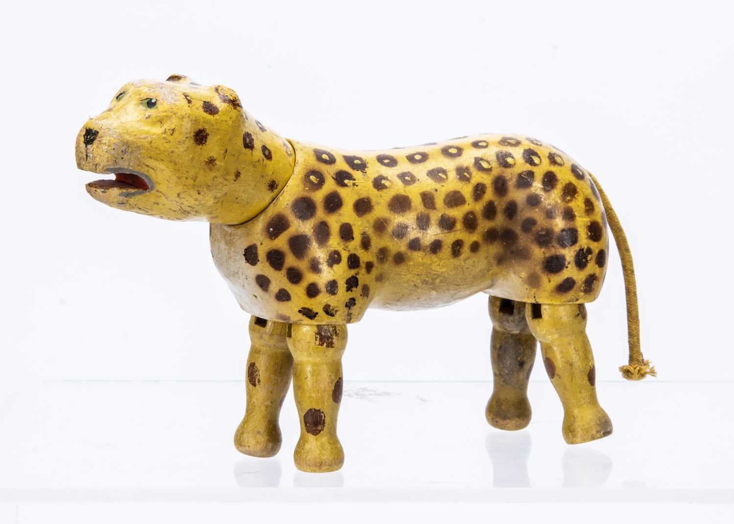 Lot 419 - A Schoenhut Humpty Dumpty Circus leopard,