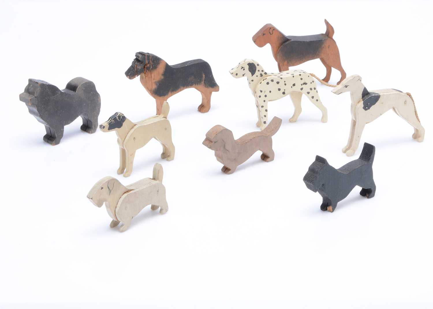 Lot 443 - Pamona wooden dogs,