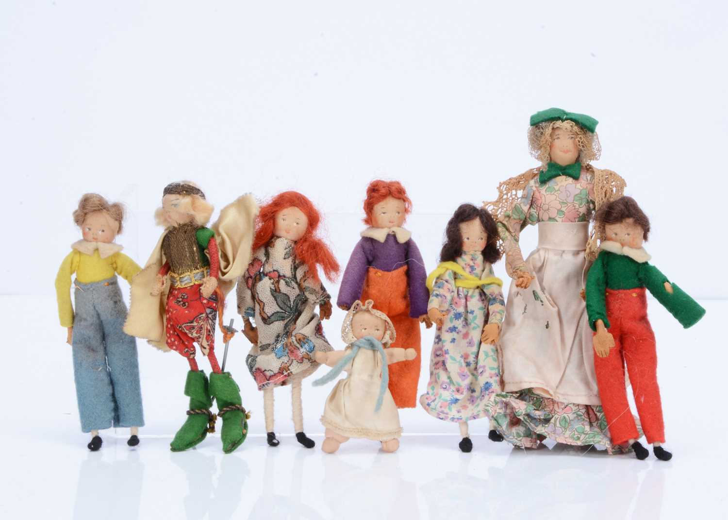 Lot 595 - Eight cloth dolls’ house dolls,